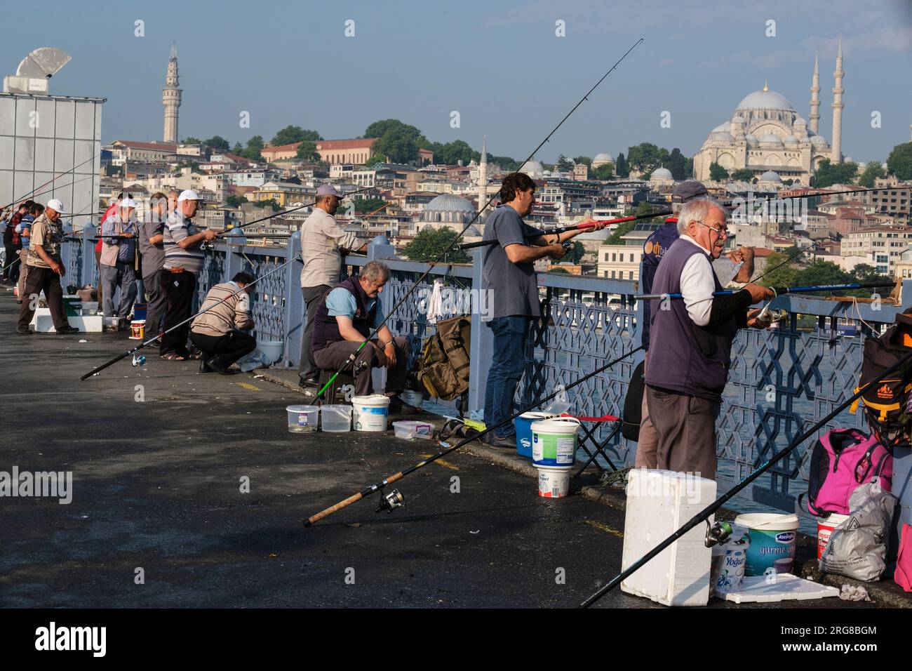 Istanbul, Turkey, Türkiye Fishermen on the Galata Bridge. Mosque of ...