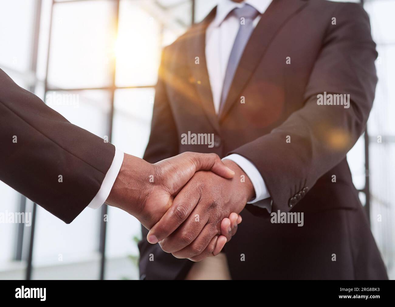 Two business men shaking hands together after successful meeting Stock ...