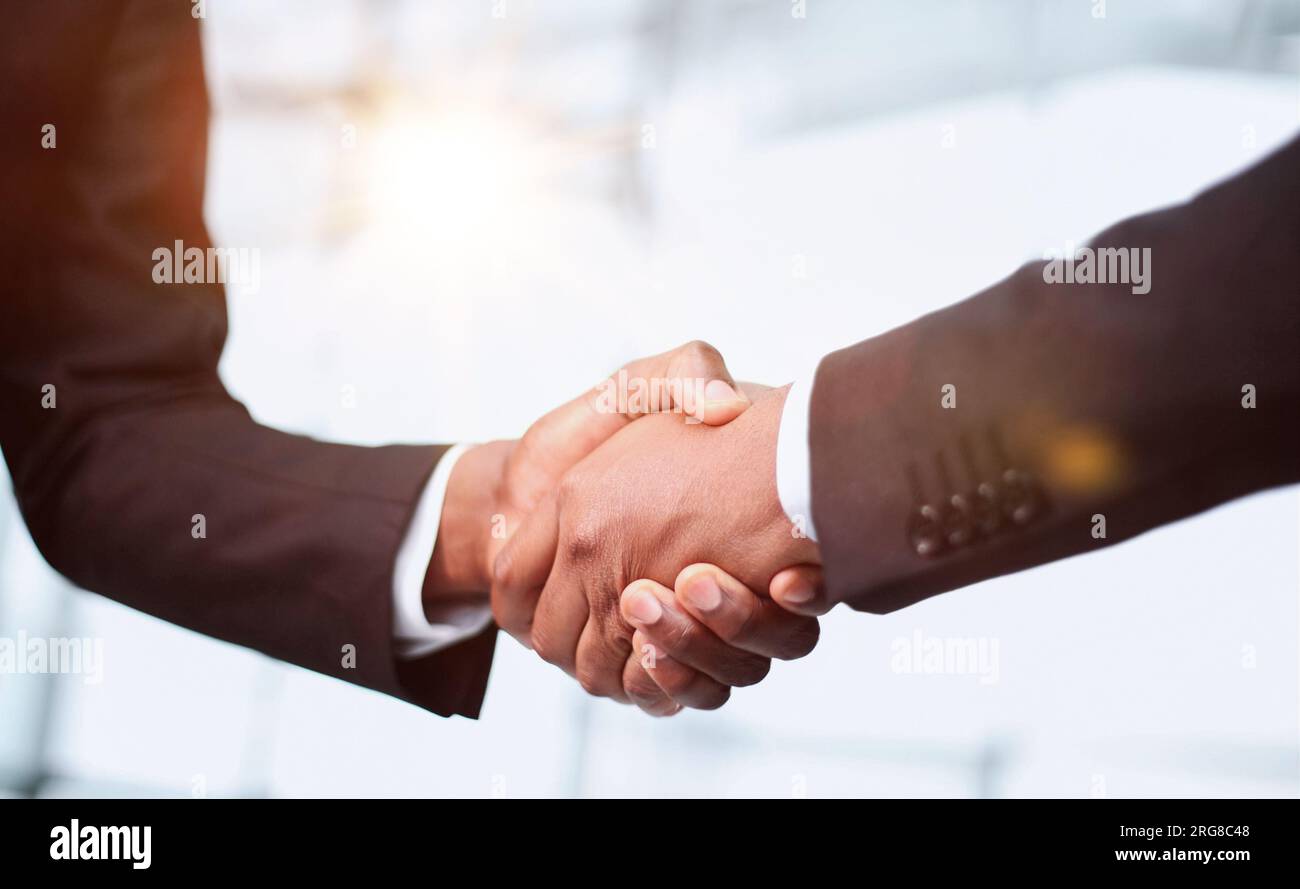 Strong agreement. A close up of handshake with gratitude. Shaking hands ...