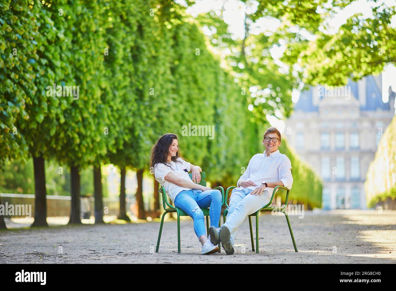 Romantic couple sitting on chair hi-res stock photography and images ...