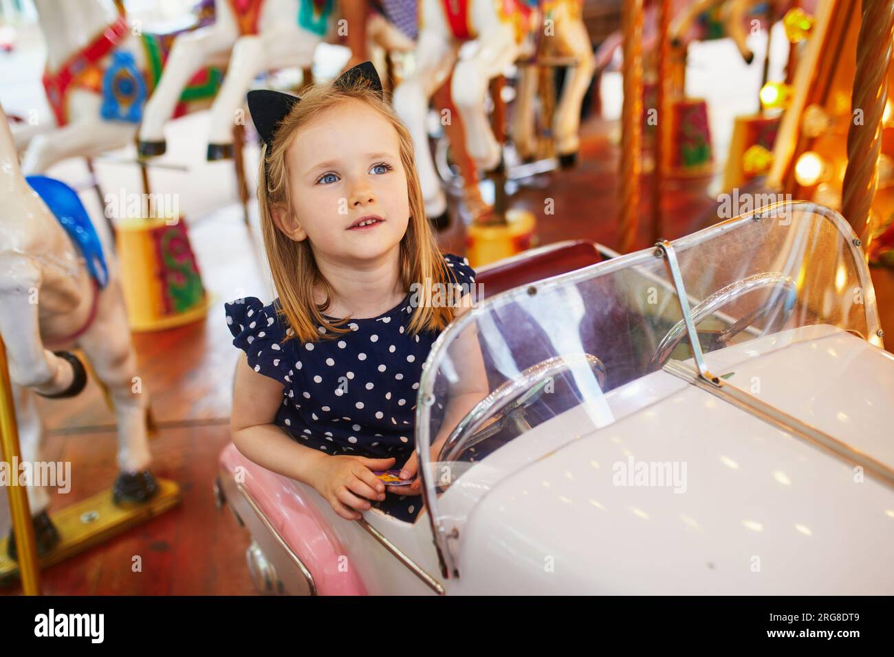 Adorable Preschooler Girl In Car On Traditional Parisian Vintage Merry