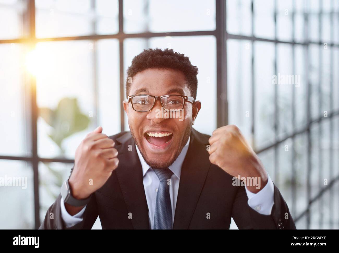 Happy confident black guy posing for headshot face front close u Stock ...