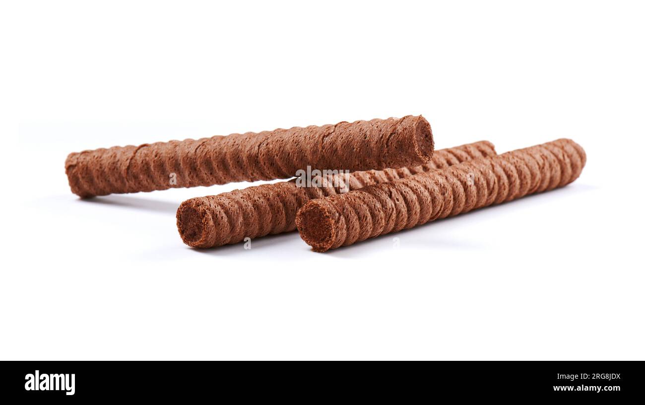 Chocolate wafer rolls with butter and cocoa filling on a white ...
