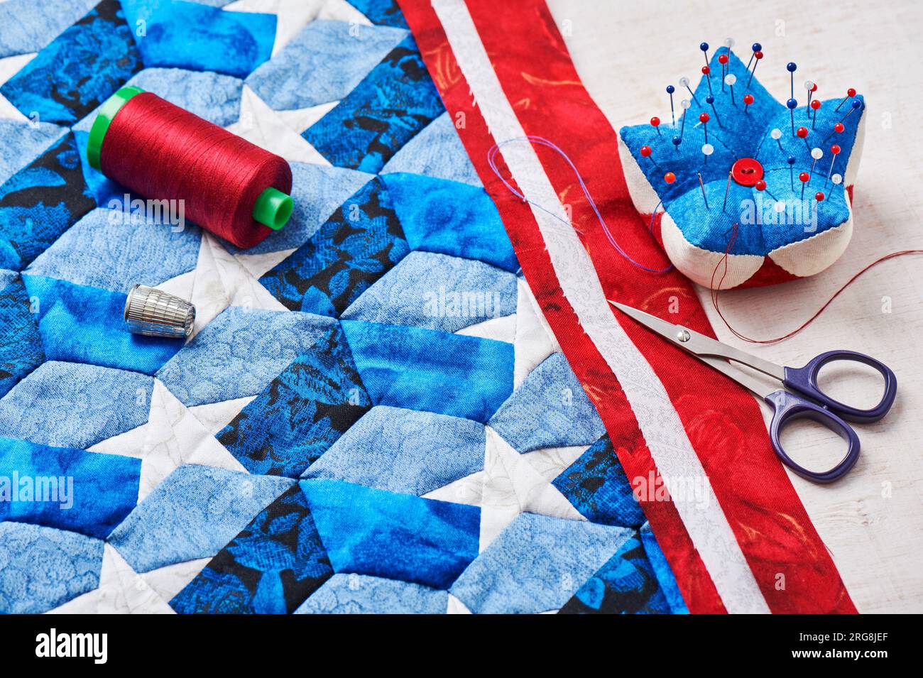 Sewing of quilt with stylized elements of American flag Stock Photo - Alamy