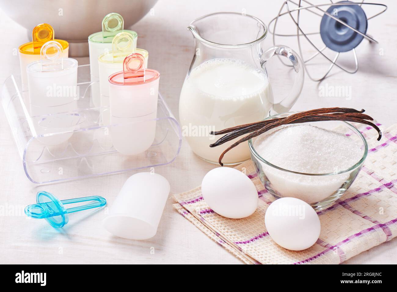 Plastic ice cream lolly form molds stand on plexiglas stand ...