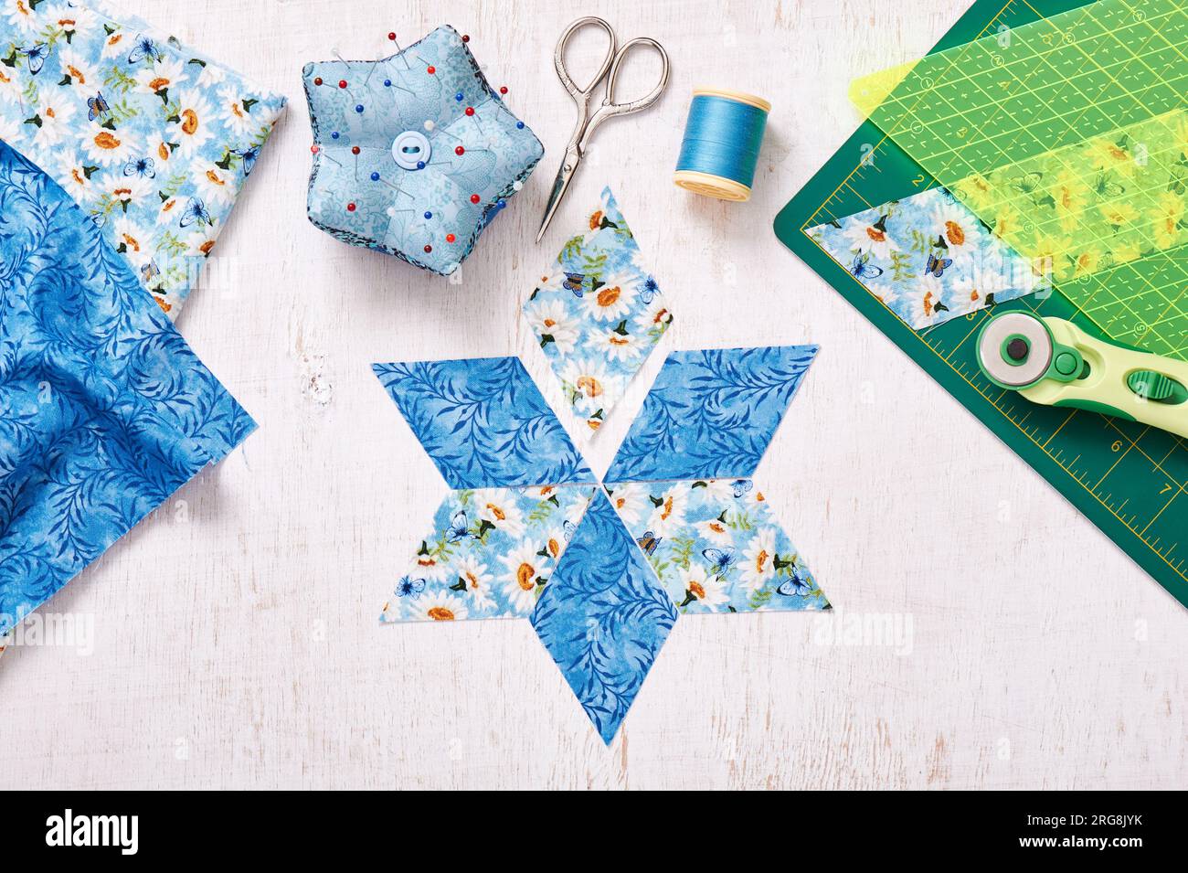 Prepare of diamond pieces of fabric for sewing quilt, top view Stock ...