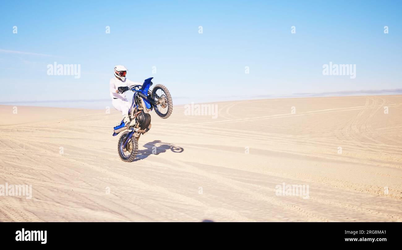 Desert, motorbike and sports person travel, journey and driving on off ...