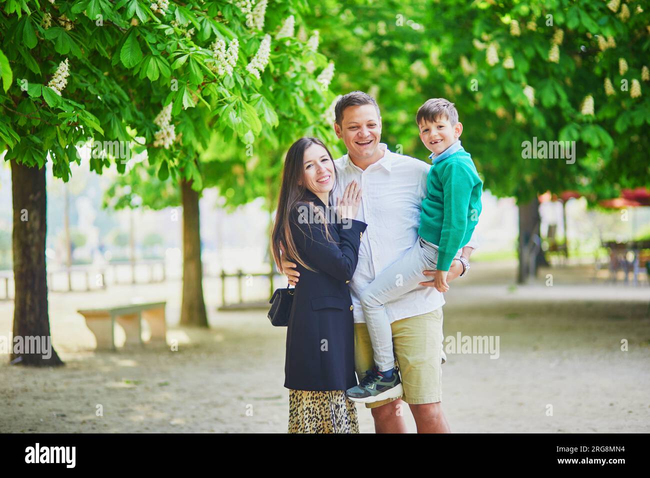 Happy family of three enjoying their trip to Paris, France. Mother ...