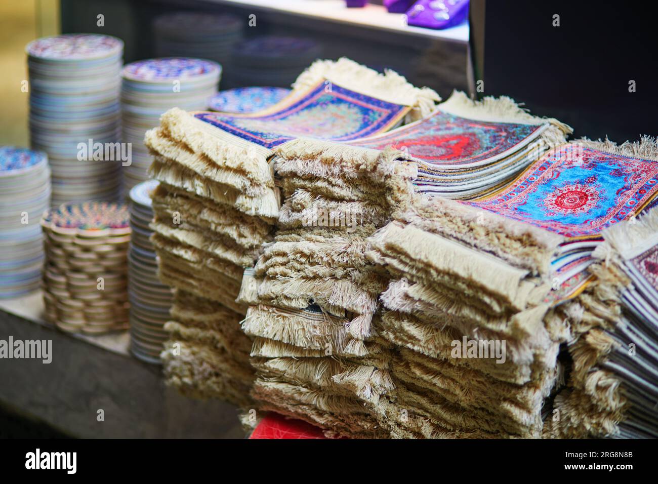 Various colorful carpets and fabrics on traditional Turkish market in ...