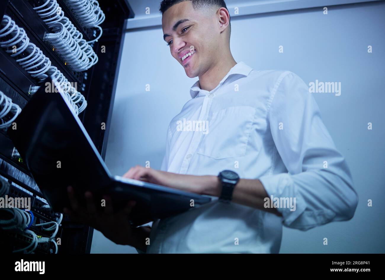 Laptop, server room technician and happy man smile for cloud computing ...