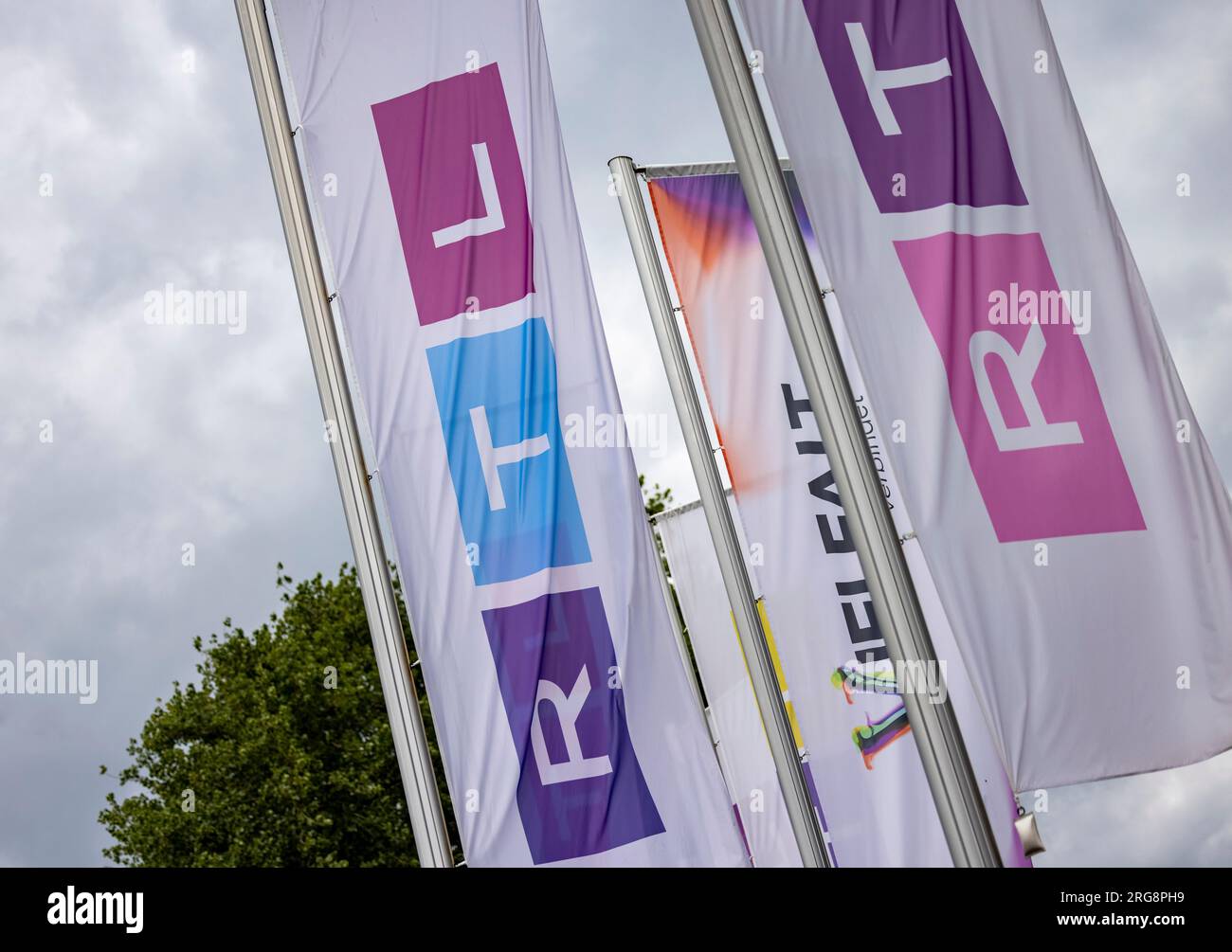 Cologne, Germany. 08th Aug, 2023. Flags with the logo of the TV channel ...