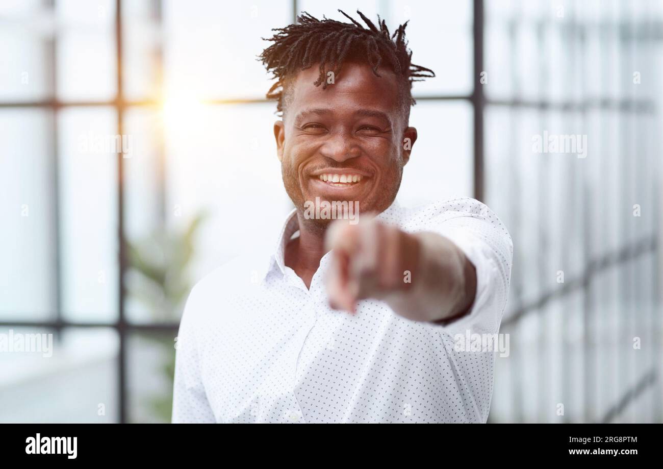 Adult man pointing camera inviting hi-res stock photography and images ...