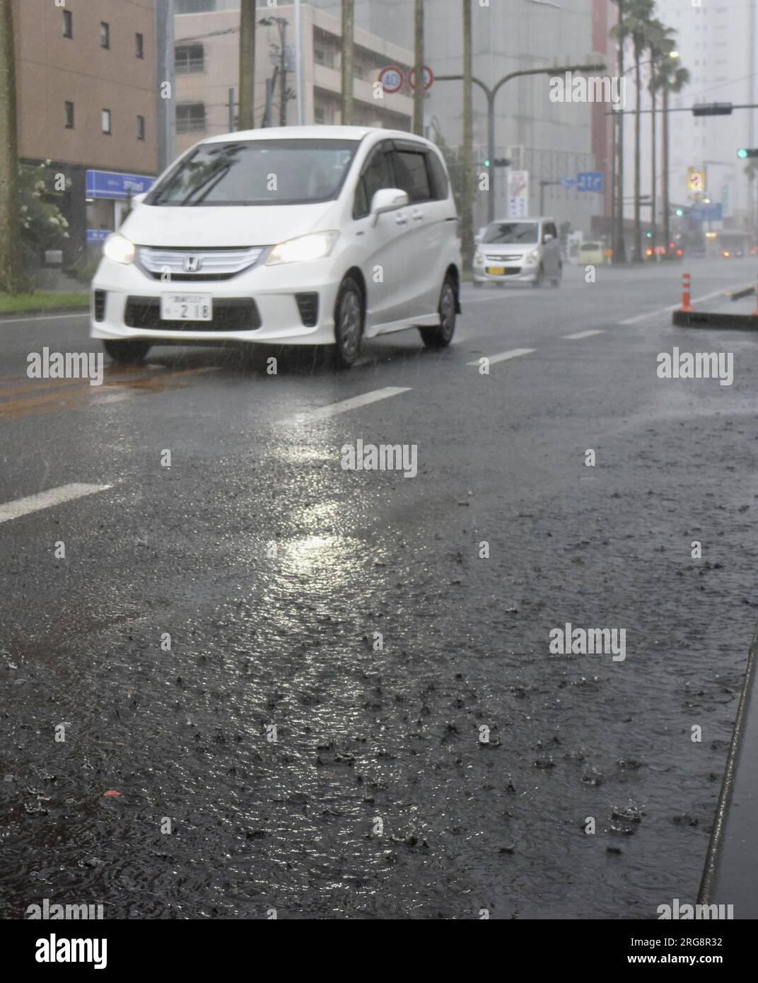 Heavy rain pounds the southwestern Japanese city of Miyazaki on Aug. 8 ...