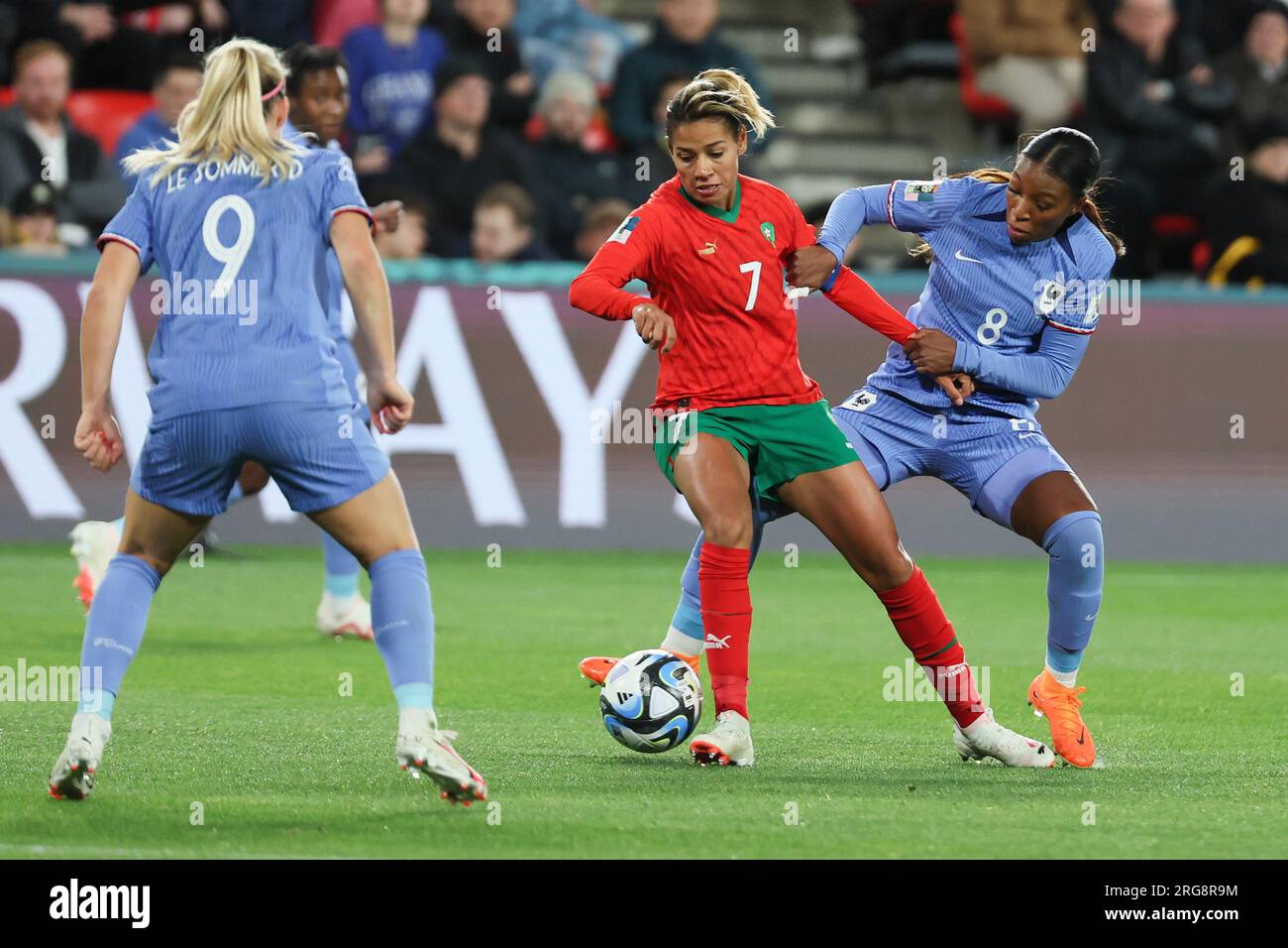 Morocco's Ghizlane Chebbak, centre, battles for the ball with France's ...