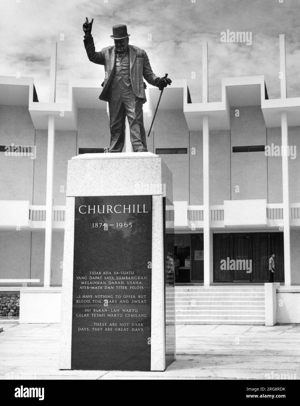 A statue of Sir Winston Churchill making the V for Victory sign outside ...