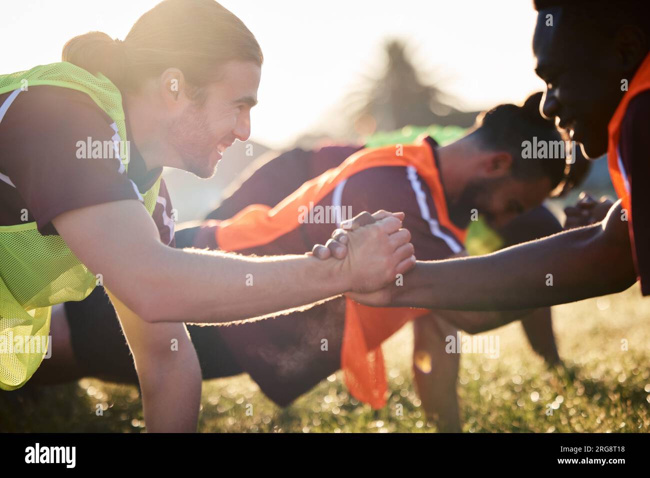Rugby, handshake and team, exercise and training, cooperation and ...