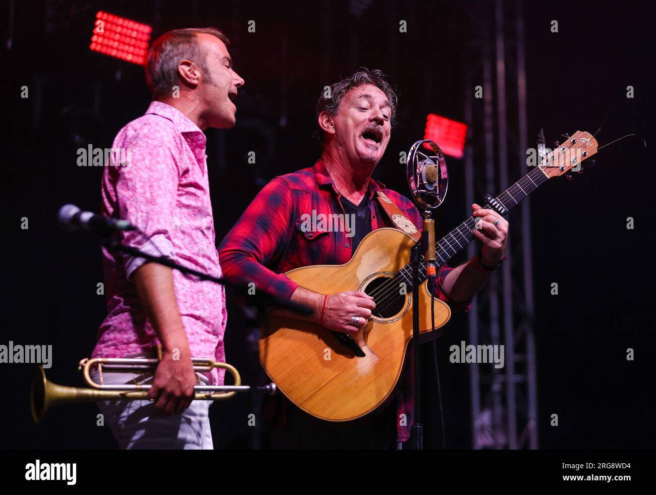 Howard Brown and Garrett Wall from the band Track Dogs perform at ...