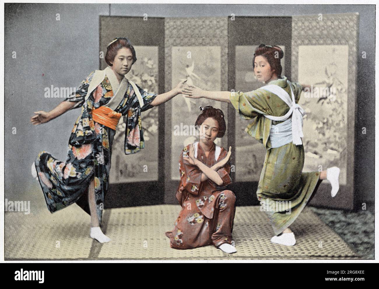 Three girls dance in the privacy of their own home, posing rather ...