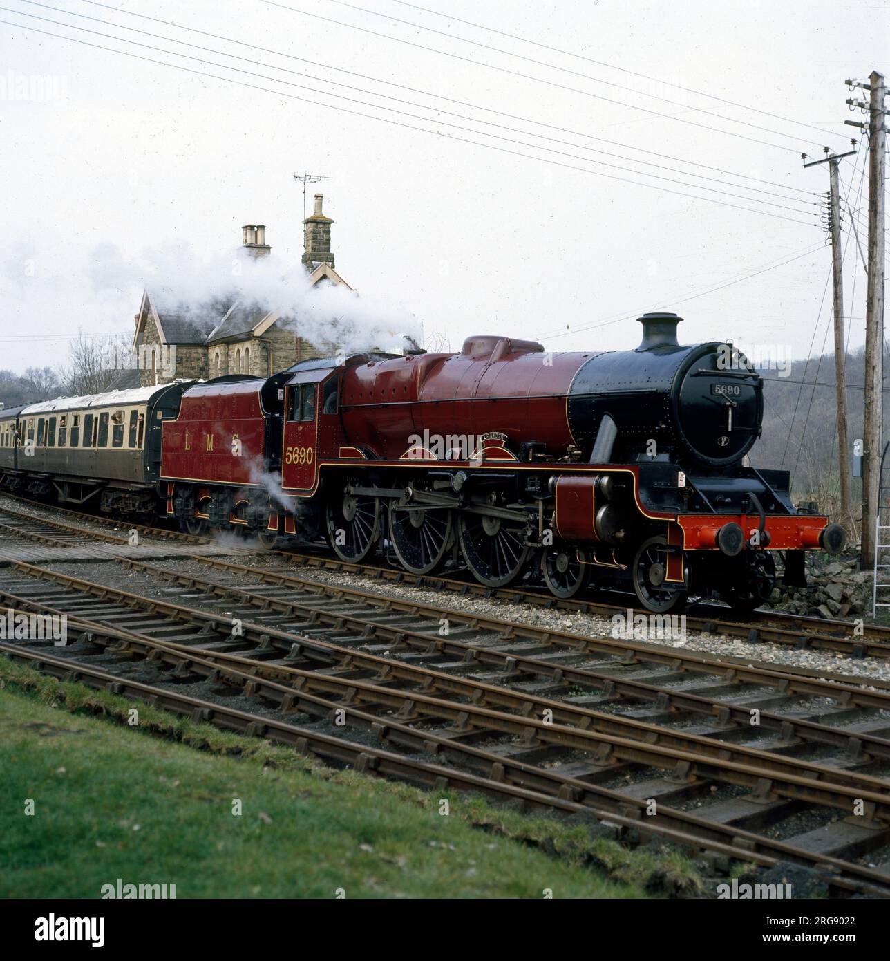 A steam locomotive engine (L.M.S. 5690 'Leander') pulling out of ...