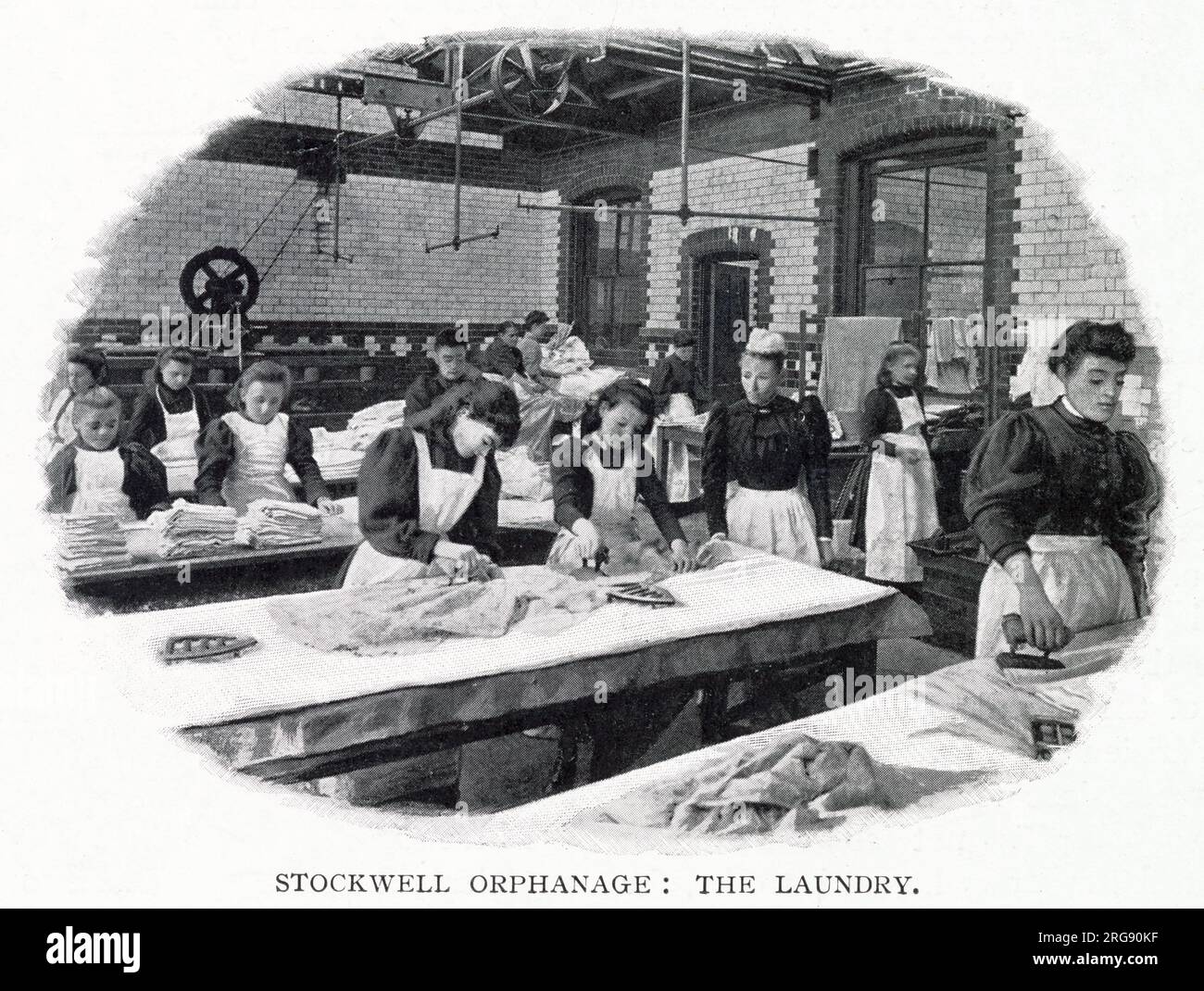 Girls learning how to do laundry correctly, maybe to do domestic work ...