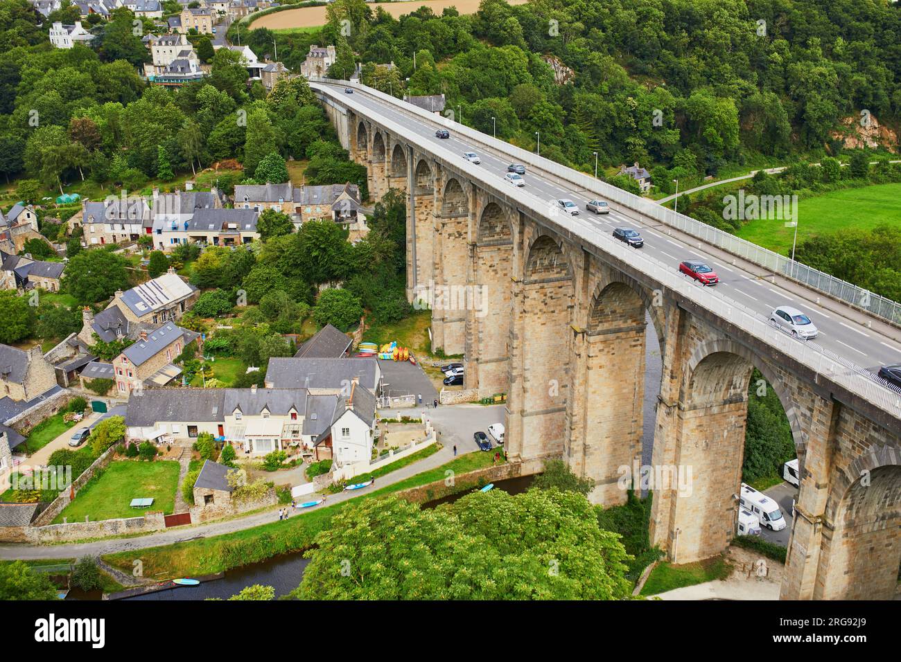 Scenic view of Dinan port and its viaduct over the river Rance, one of ...