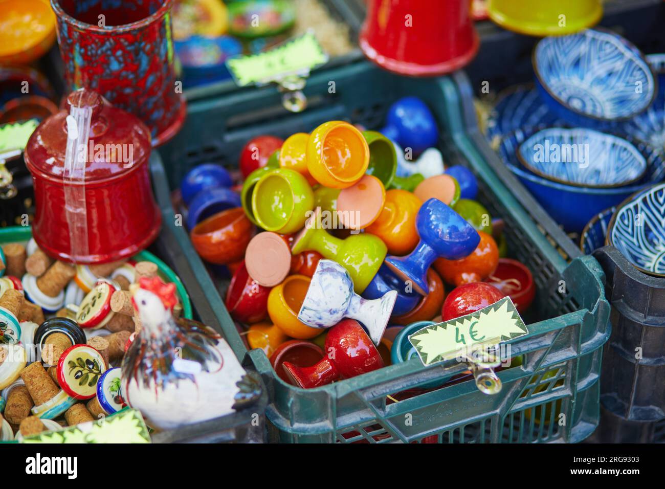 Colorful clay crockery on a farmer market in Cucuron, Provence, France ...