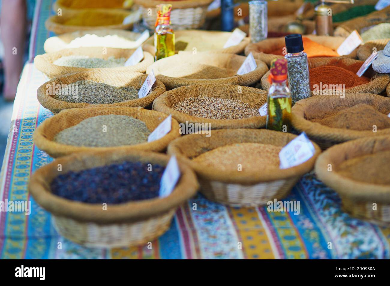 Different kinds of spices and dried herbs on a farmer market in Cucuron ...