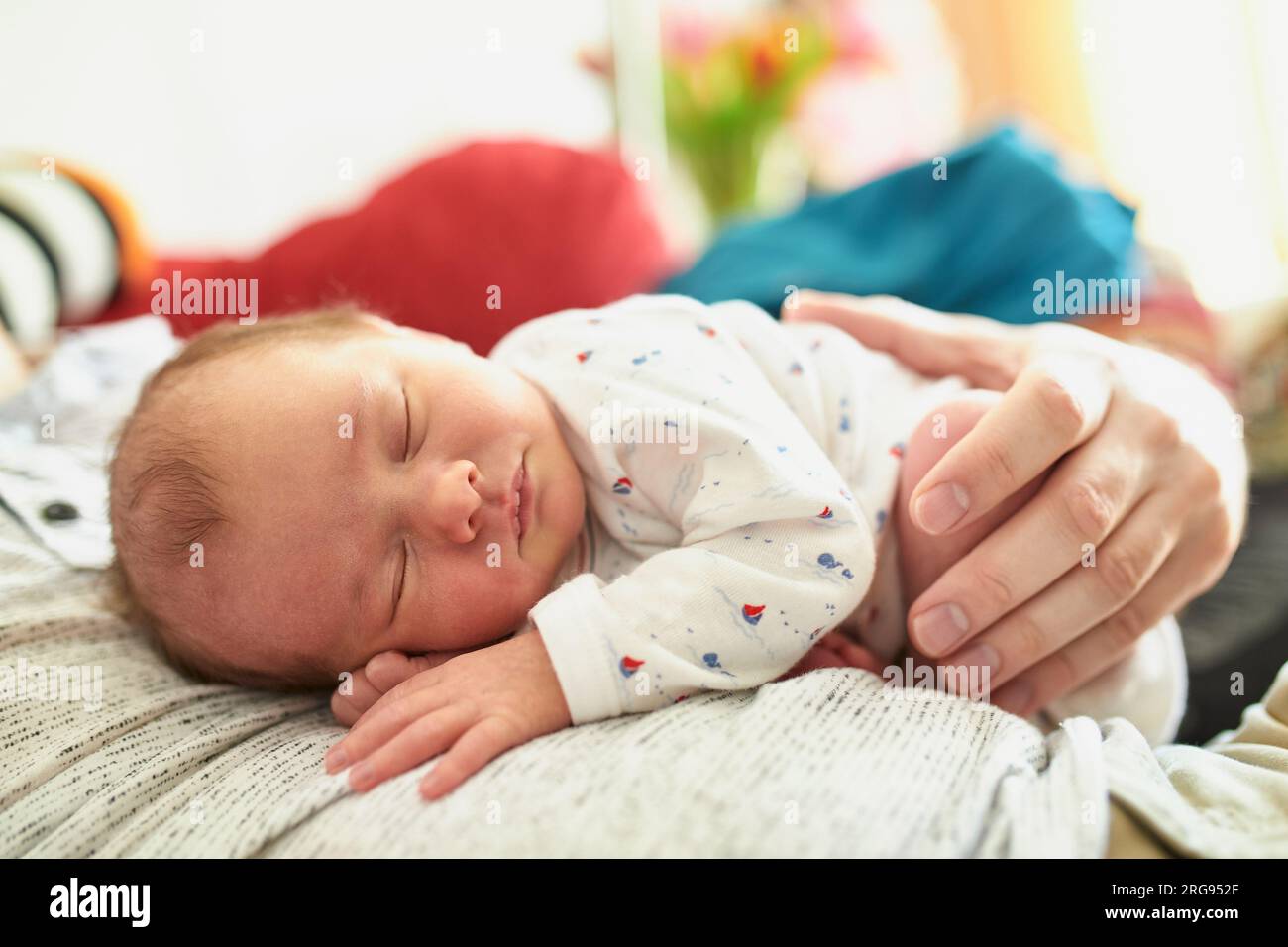 Adorable newborn baby girl sleeping on her father's chest Stock Photo ...