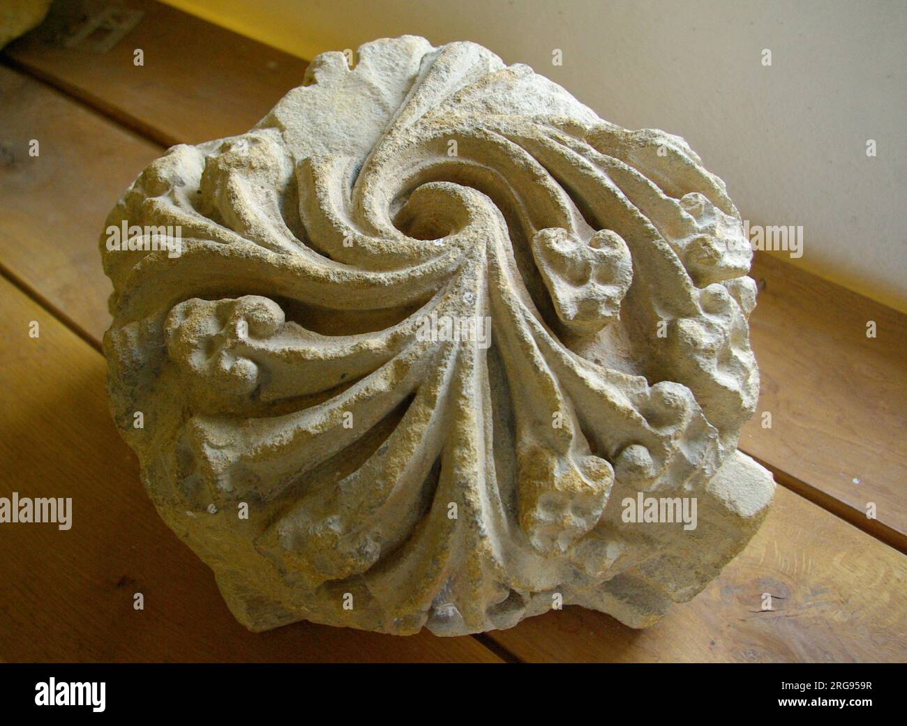 Carved stone boss on display in Muchelney Abbey, a Grade I listed ...