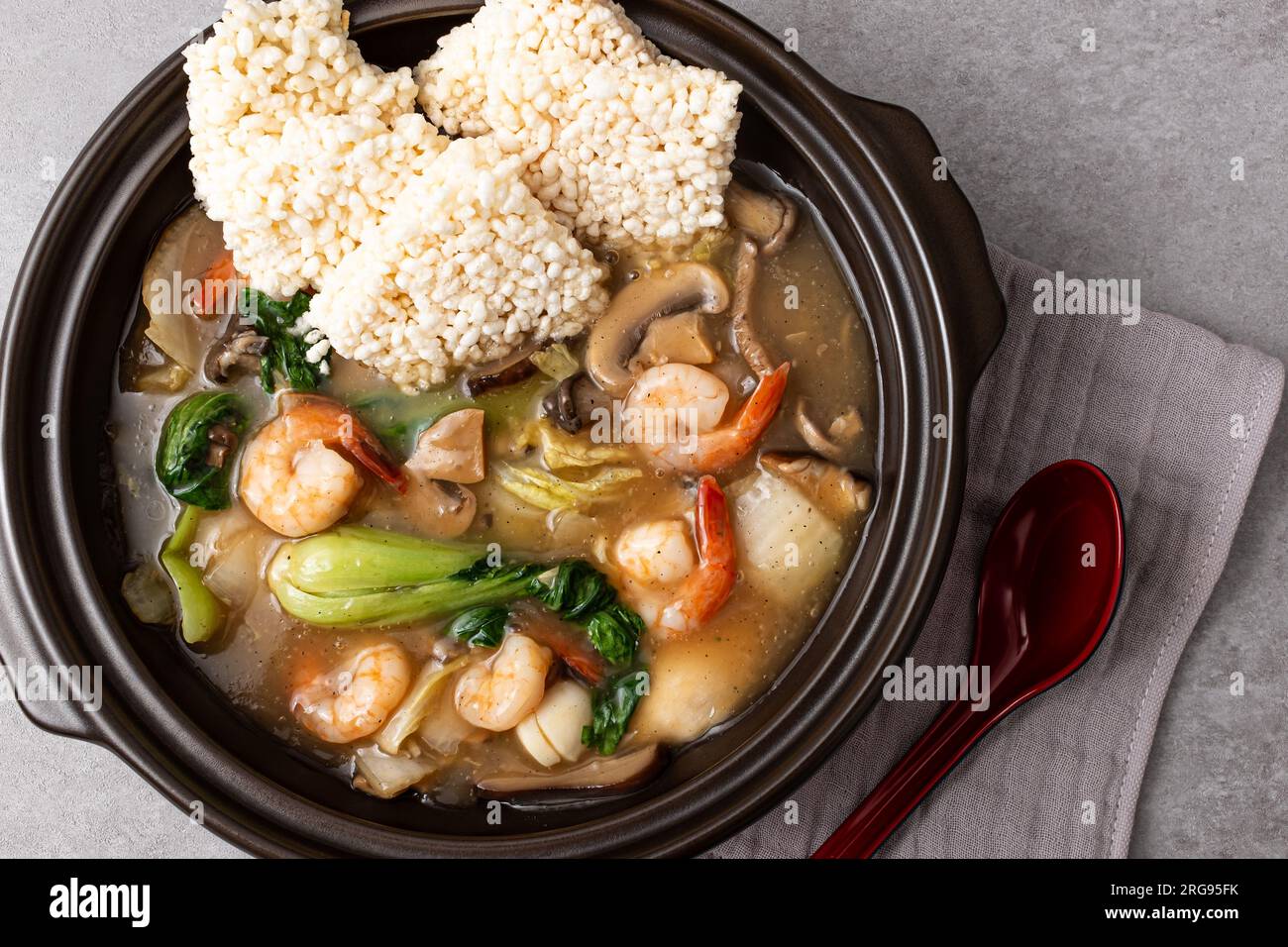 Seafood Fried Glutinous Rice Soup with Seafood and Vegetables and Fried ...