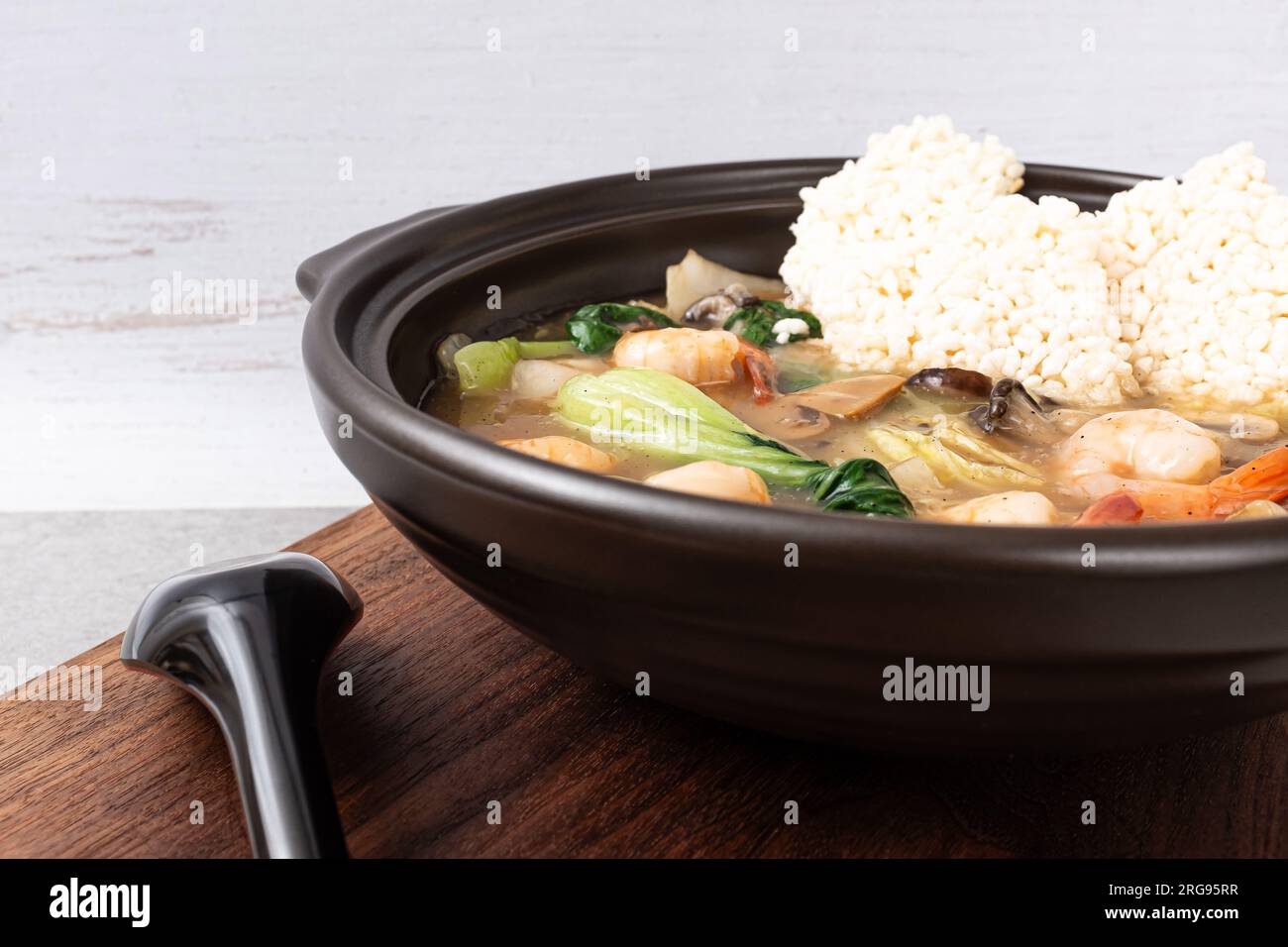 Seafood Fried Glutinous Rice Soup with Seafood and Vegetables and Fried ...