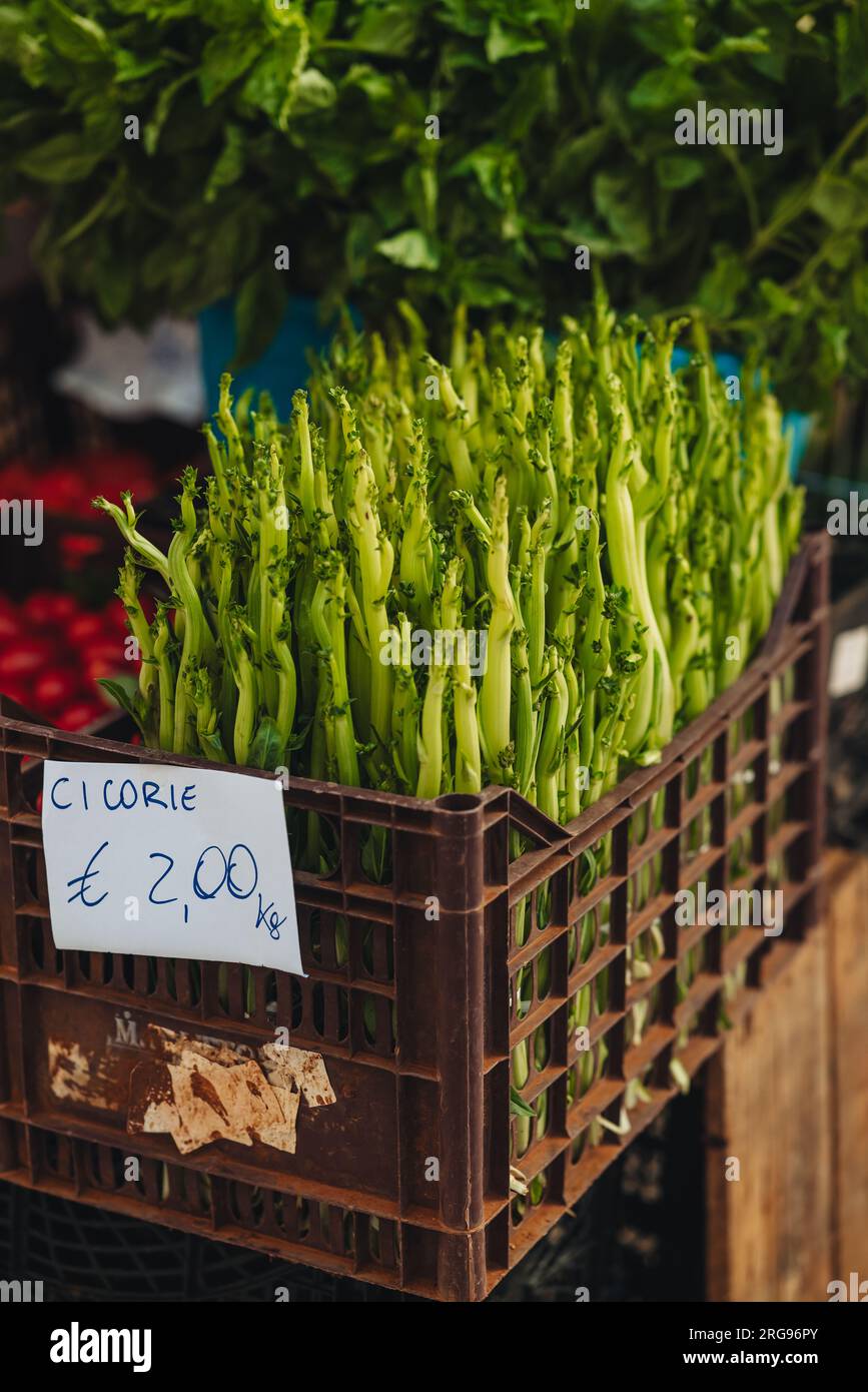 Fresh raw chicory at the farm market in Puglia Stock Photo - Alamy