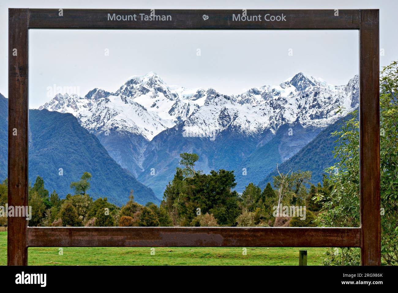 New Zealand. Lake Matheson Walk. South island. Aoraki Mount Cook and Mount Tasman Stock Photo ...