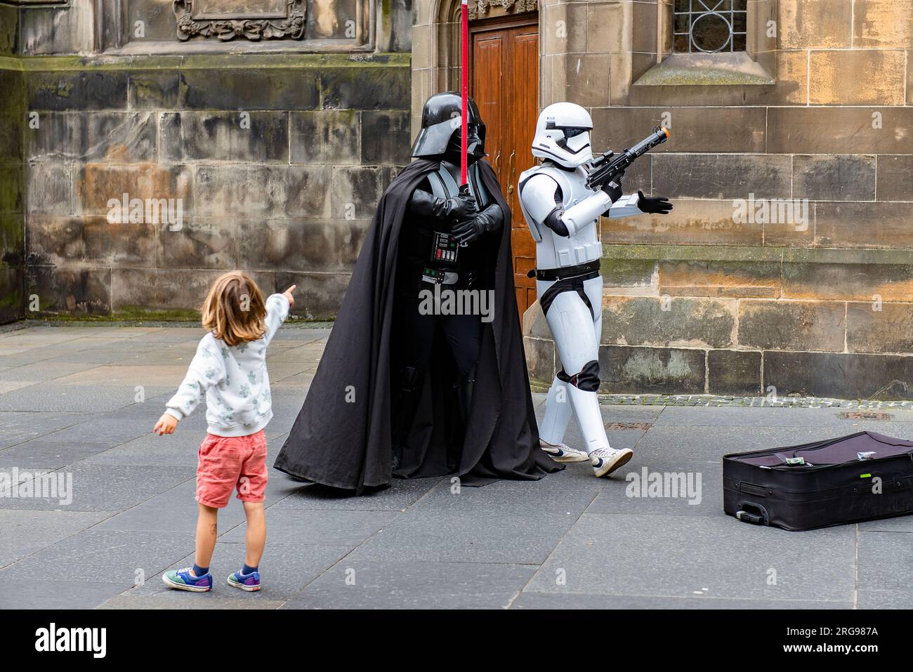 Child watching street performers in Star Wars costumes on the Royal ...