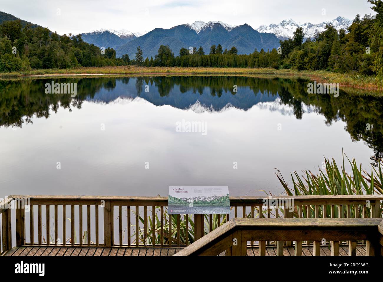 New Zealand. Lake Matheson. In the background Mount Tasman and Aoraki ...