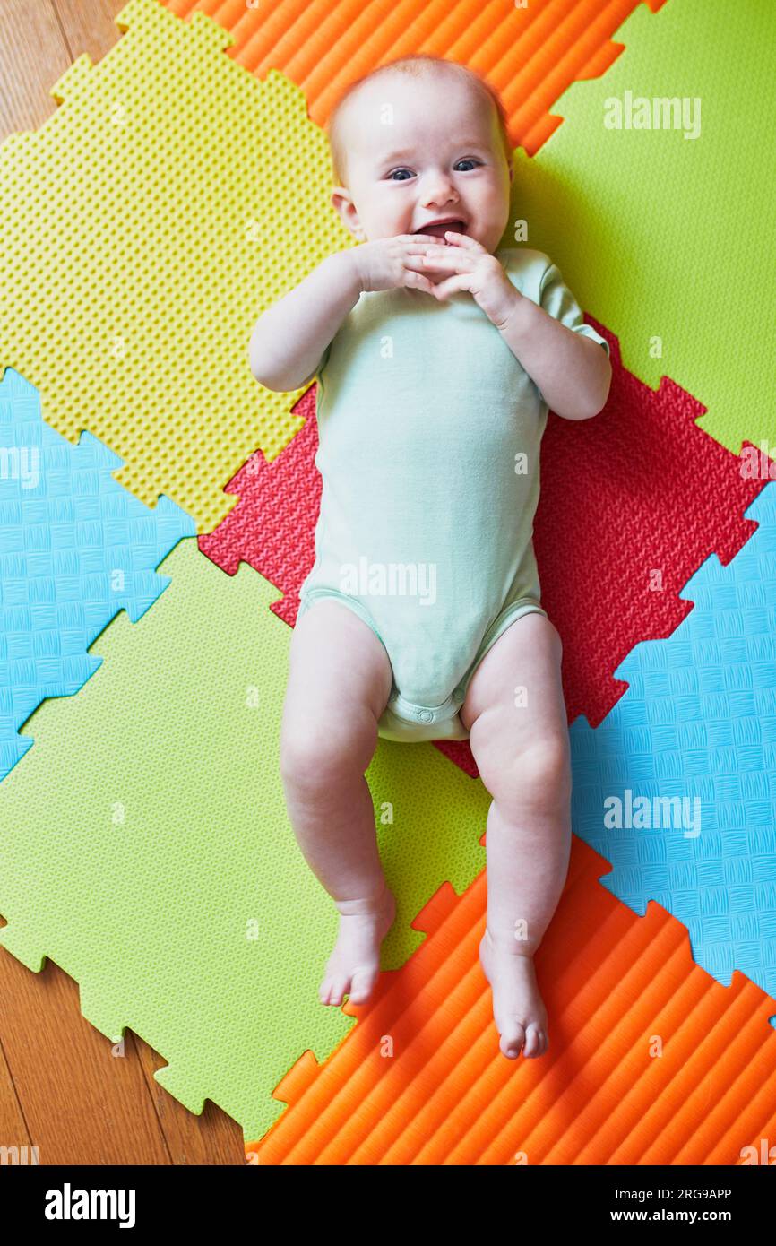 Baby from above arms hi-res stock photography and images - Alamy