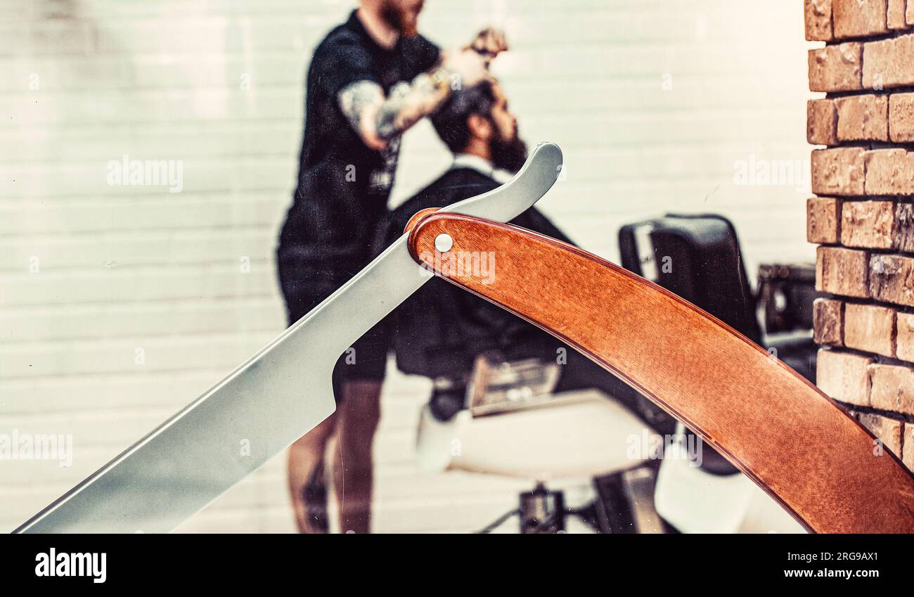 Barber shop, razor. Vintage straight razor. Hair salon. Closeup ...