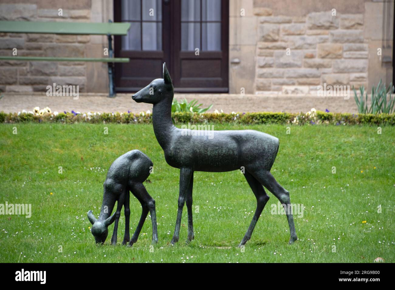 Landscape of deer statue in garden of Schloss Ceclienhof castle in ...