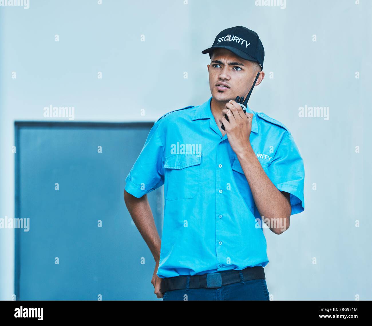 Walkie talkie, security guard and man in office in communication ...