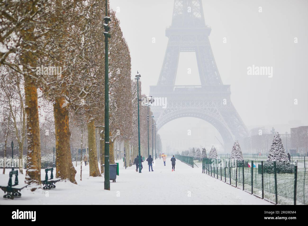 Scenic view to the Eiffel tower on a day with heavy snow. Unusual ...