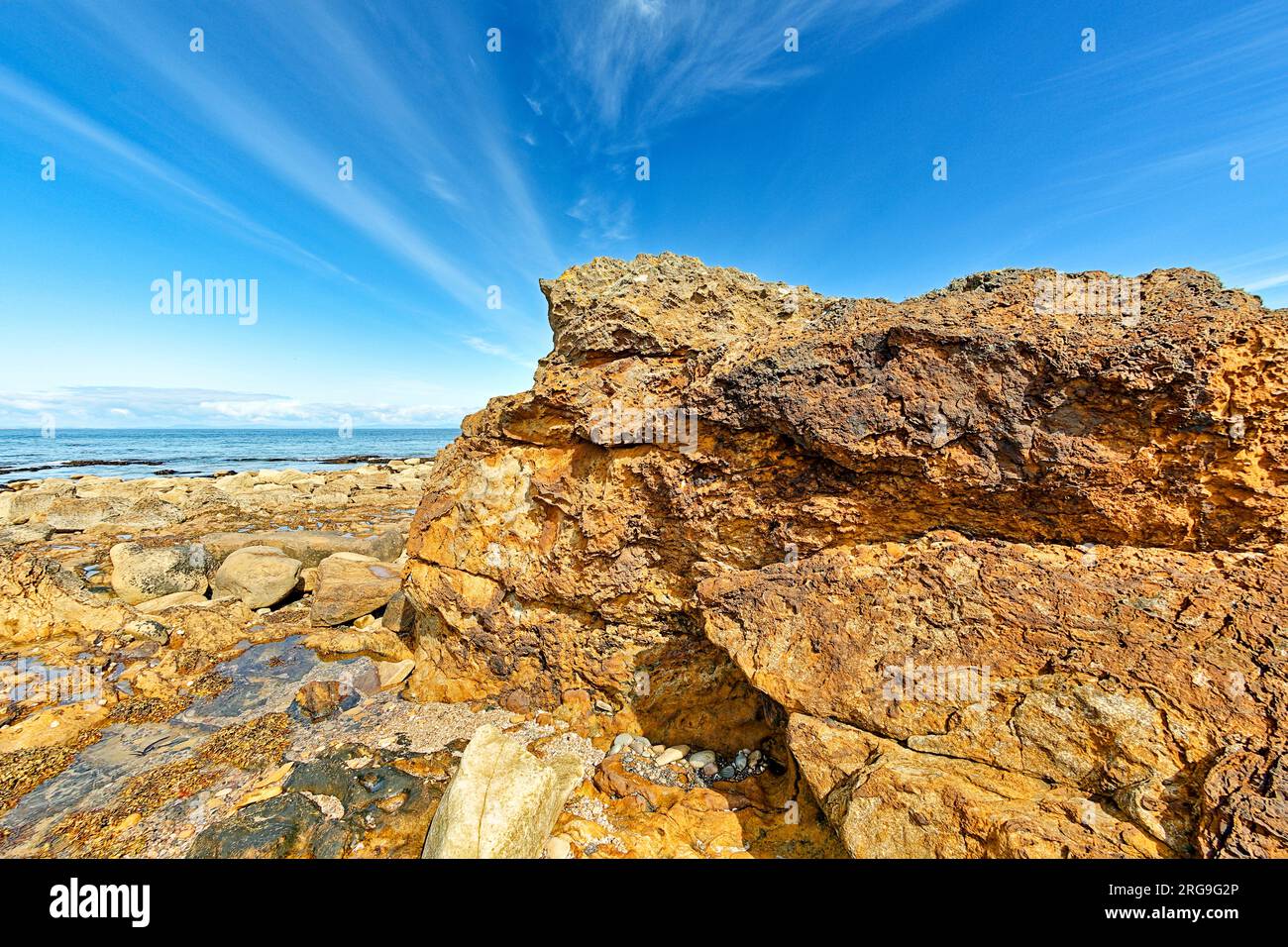 Hopeman Beaches a weathered rock of Hopeman Sandstone in Moray Firth ...