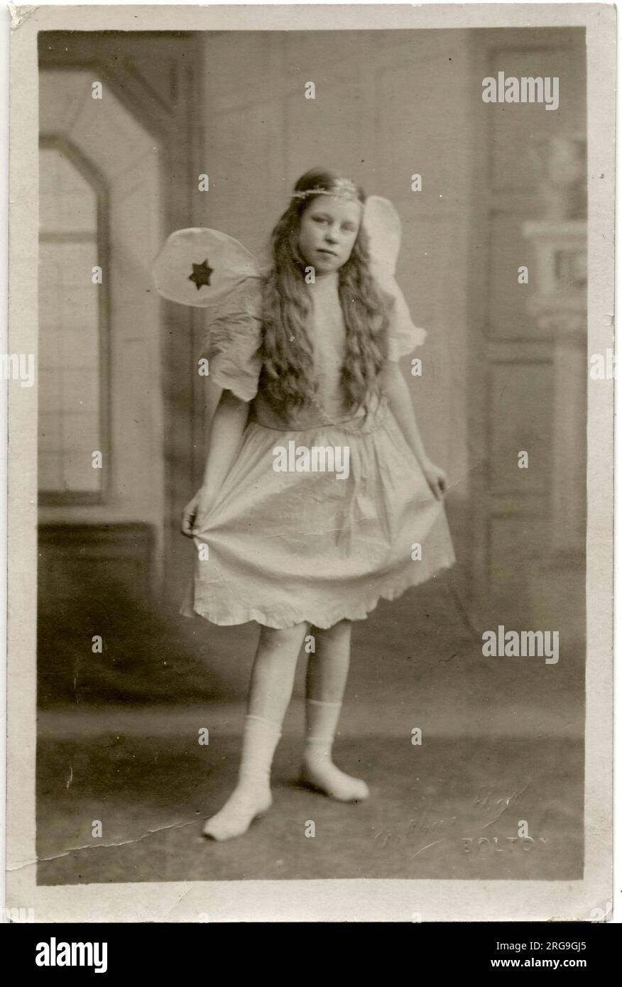 A little girl called Maggie in fancy dress, wearing a fairy costume on ...