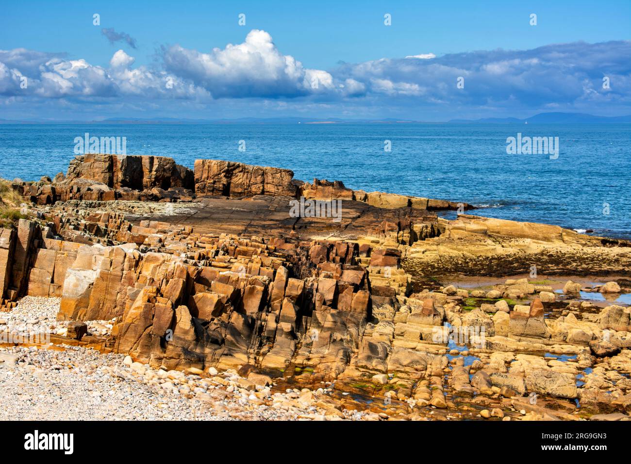 Hopeman Beaches rocks consisting of Hopeman Sandstone (Permo-Triassic ...