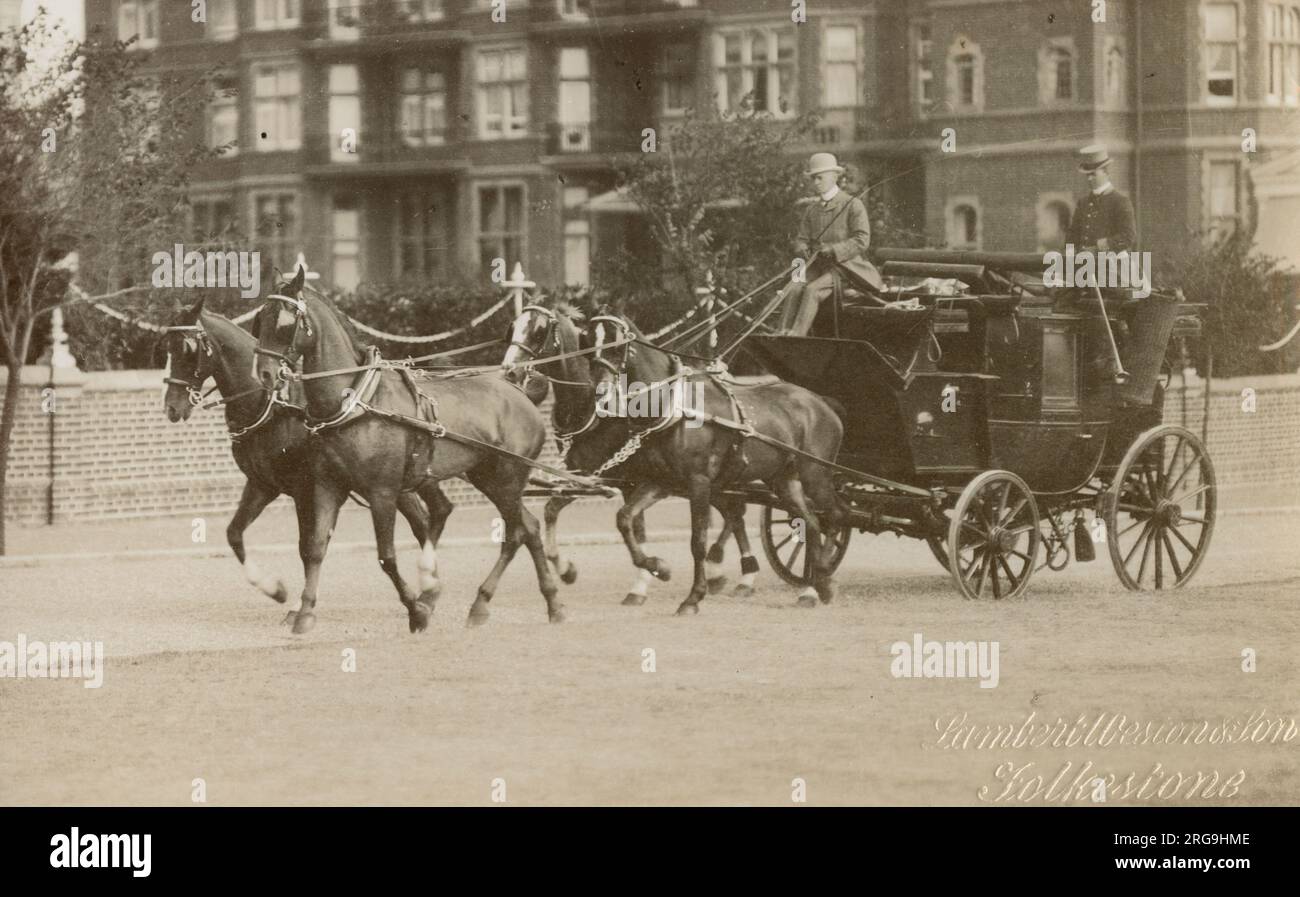 Four-horse team heritage mail coach speeding through Folkestone, Kent ...