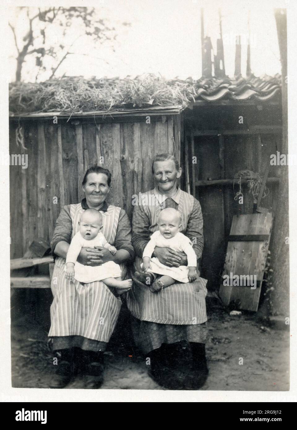 Two very jolly Grandmothers with their Grandchildren (or Great ...