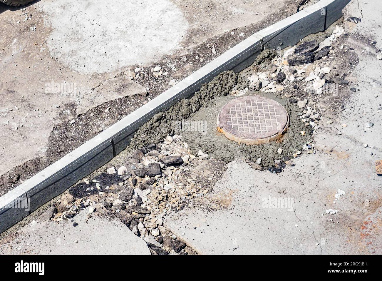 Road and sidewalk are full of holes. Road surface repair. Eliminate ...