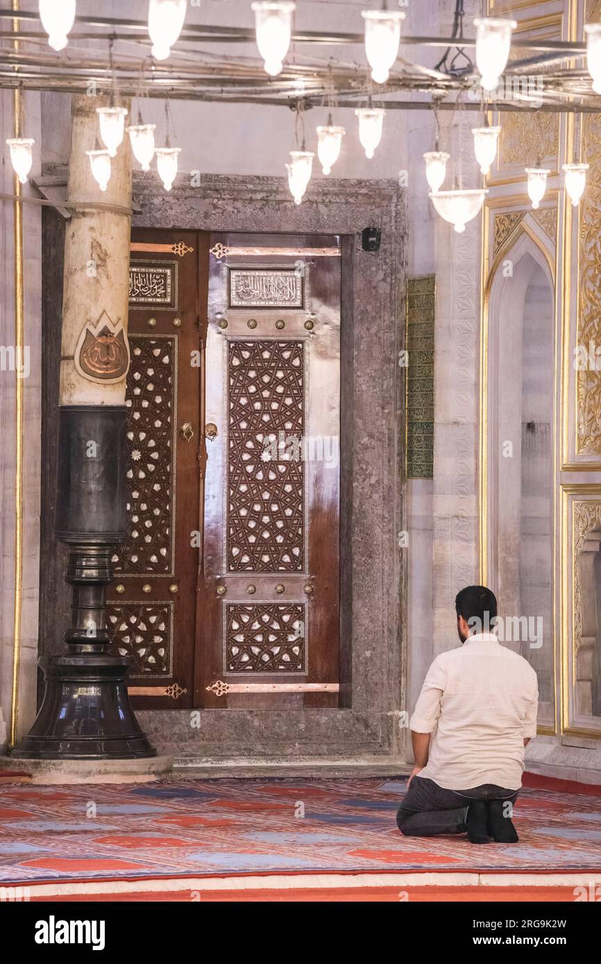 Istanbul, Turkey, Türkiye. Man Praying in the Blue Mosque (Sultan Ahmed ...