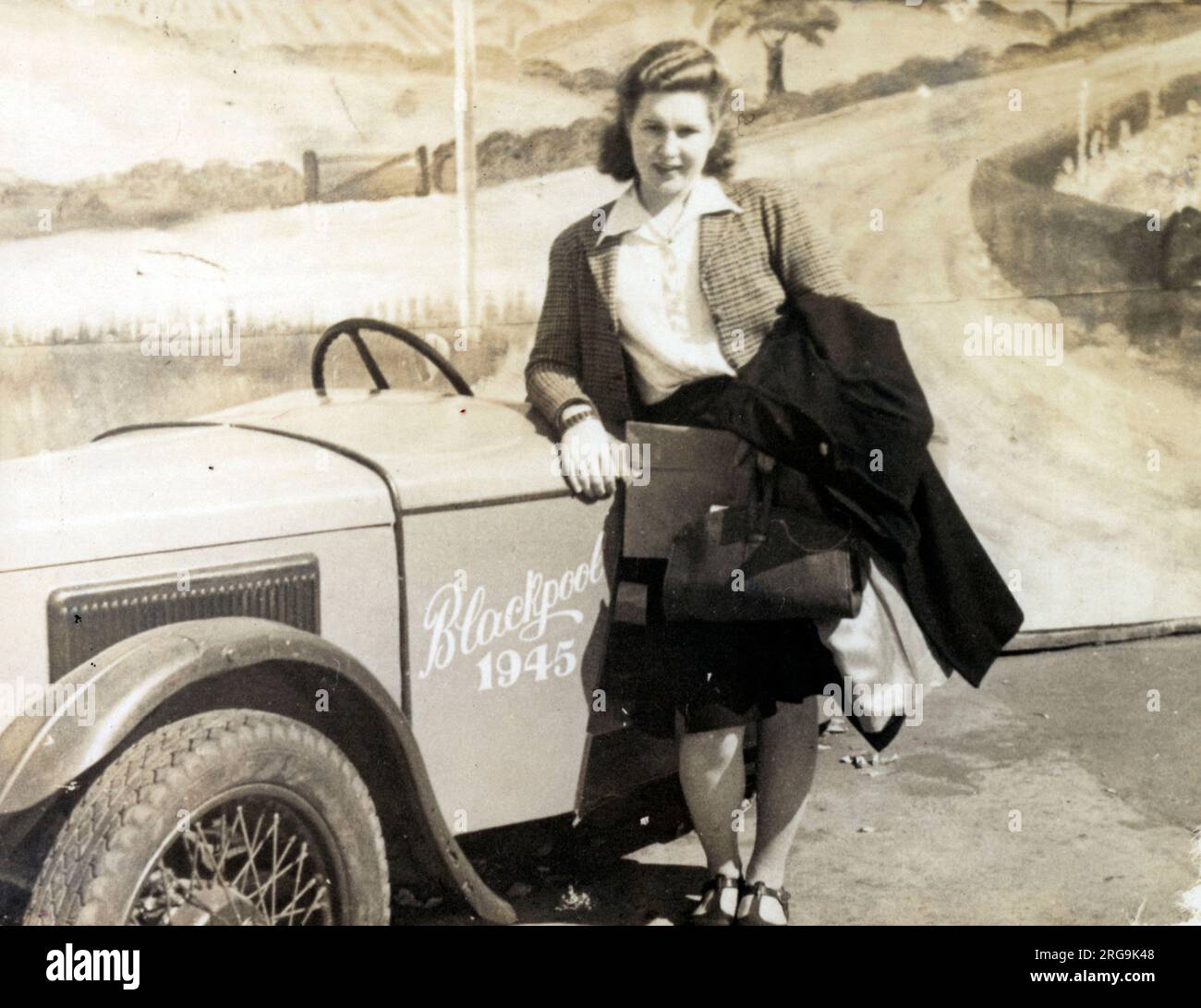 Young lady on the Blackpool seafront poses for a 'Sunny Snaps ...