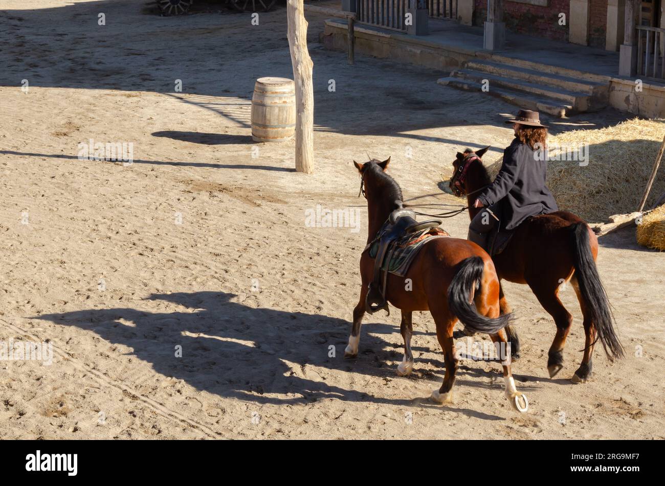 ALMERIA, SPAIN - 17 DECEMBER 2022 Dressed in distinctive Wild West ...