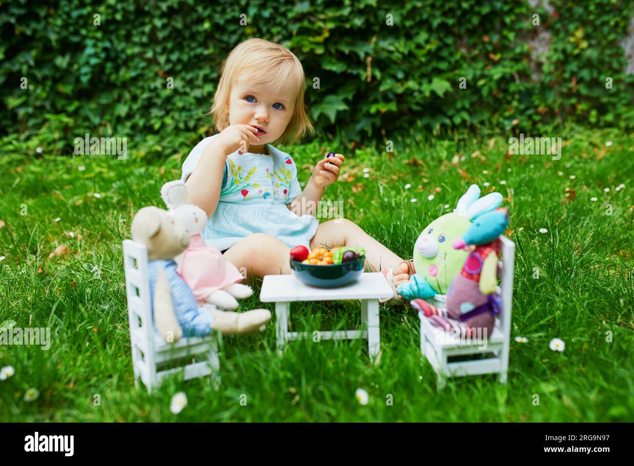 Kids playing game dinner table hi-res stock photography and images - Alamy